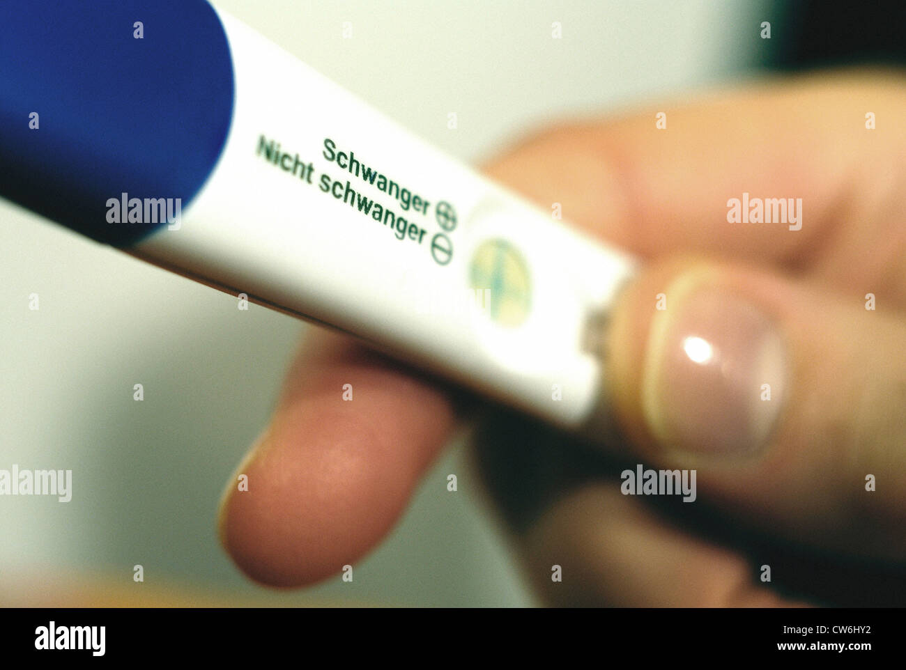woman with pregnancy test Stock Photo - Alamy