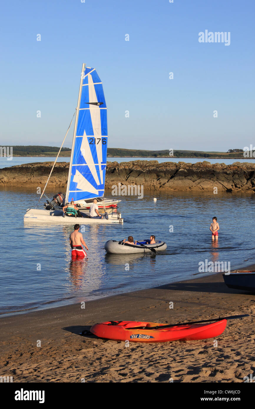 Boats on beach and in sea at Mossyard bay near Gatehouse of Fleet ...