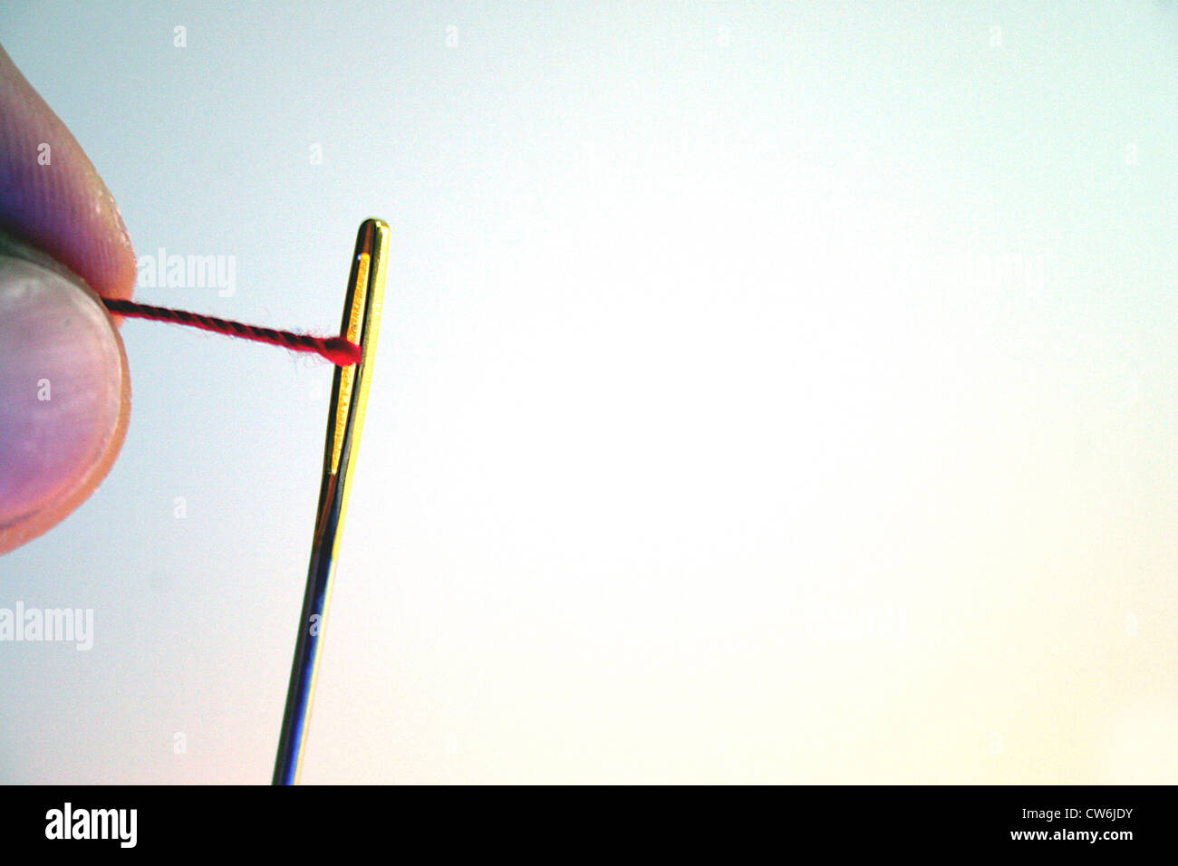 Threading Needle High Resolution Stock Photography and Images - Alamy