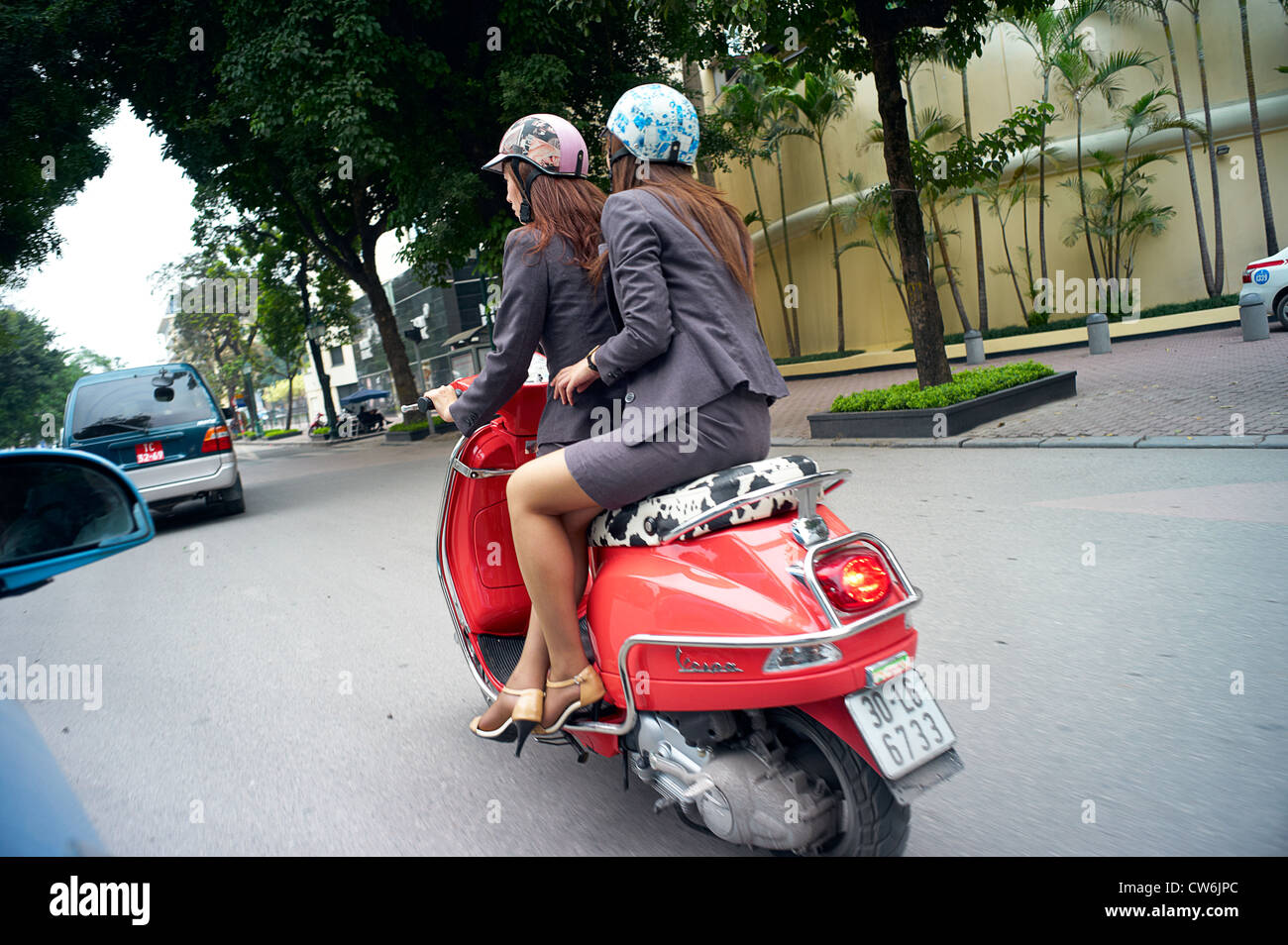 Vietnam two women on scooter hi-res stock photography and images - Alamy