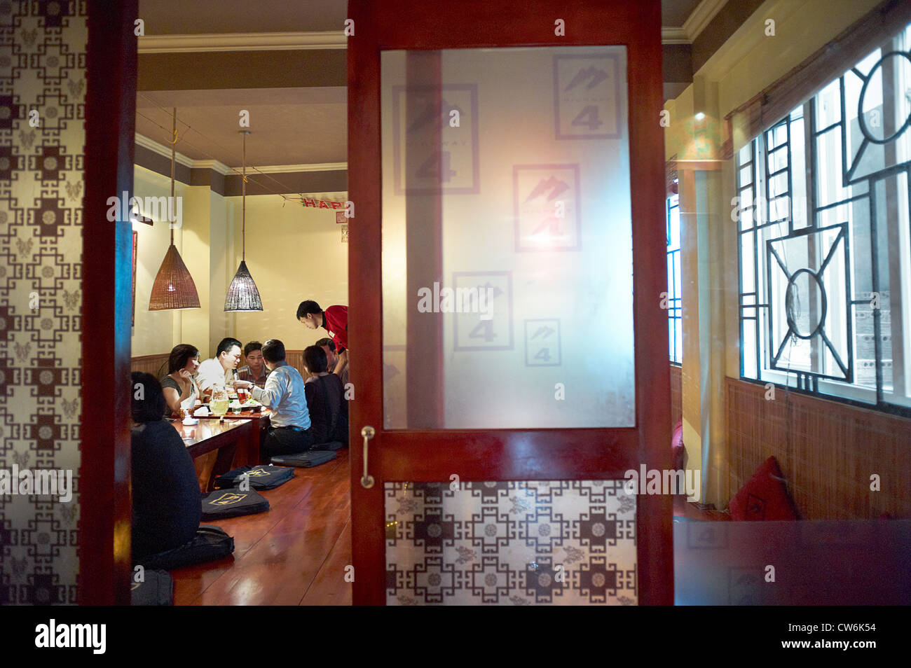 People eating at a restaurant in Vietnam called Highway 4 Restaurants ...