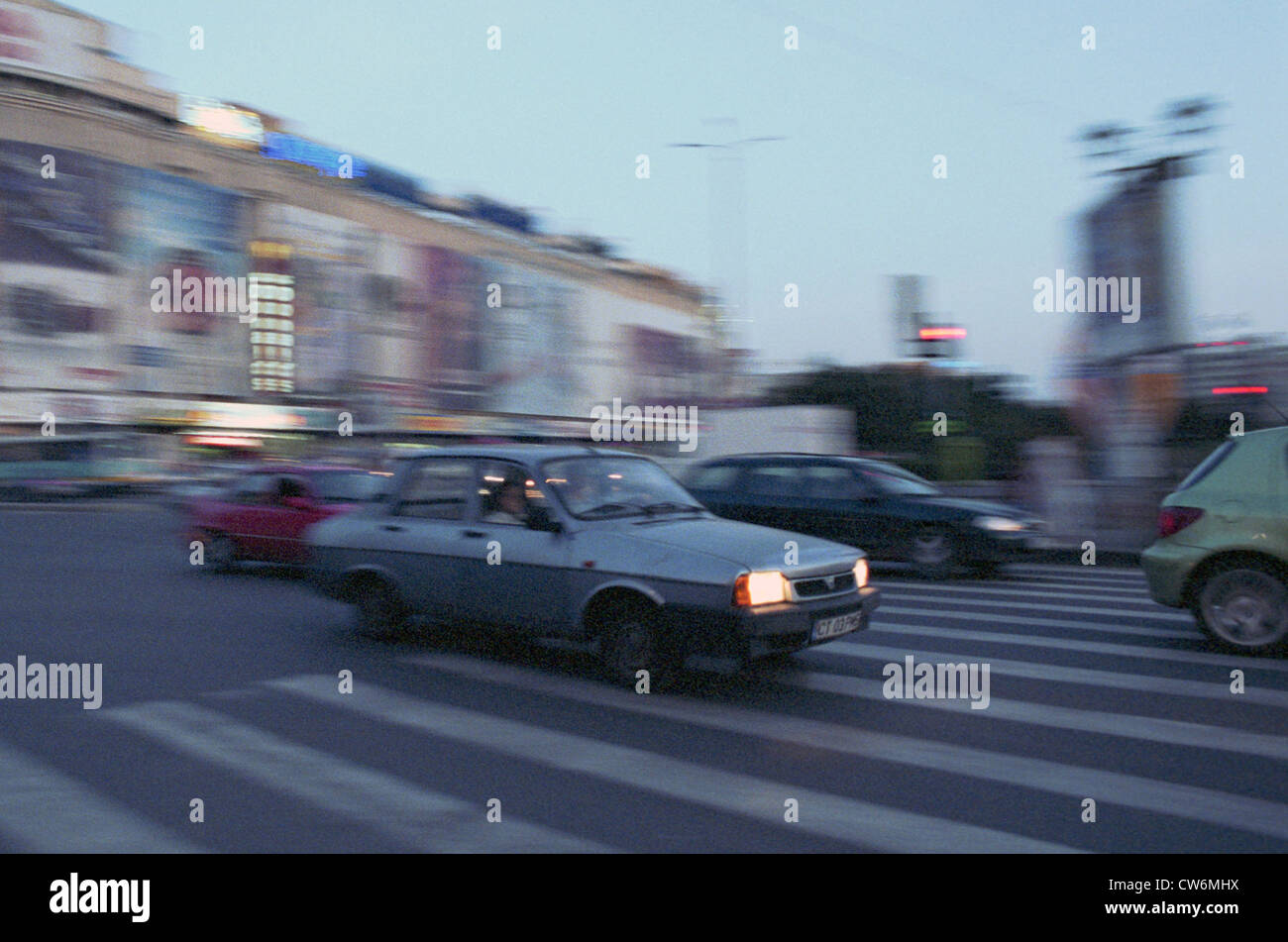 City traffic at Unity Square (Piata Unirii) in Bucharest Stock Photo ...