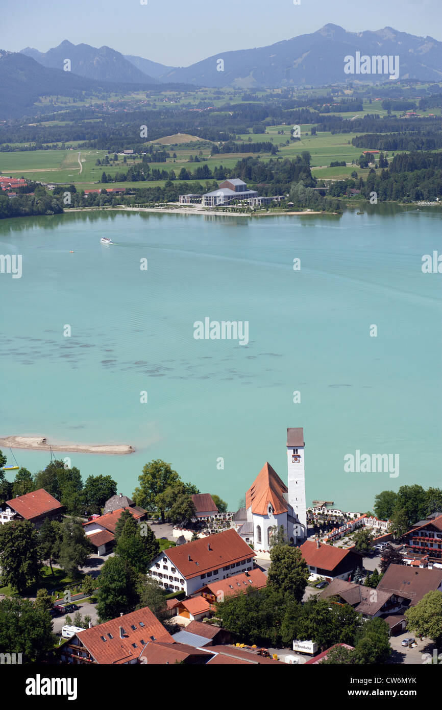 church at Forggensee, in the background theatre, Germany, Bavaria ...