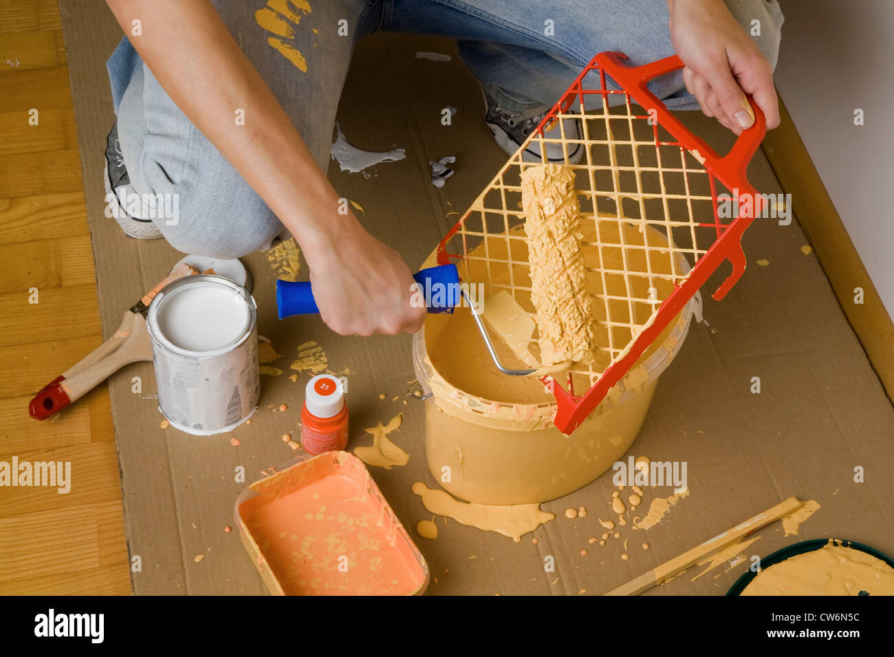 Bucket with colour and paint tools Stock Photo - Alamy