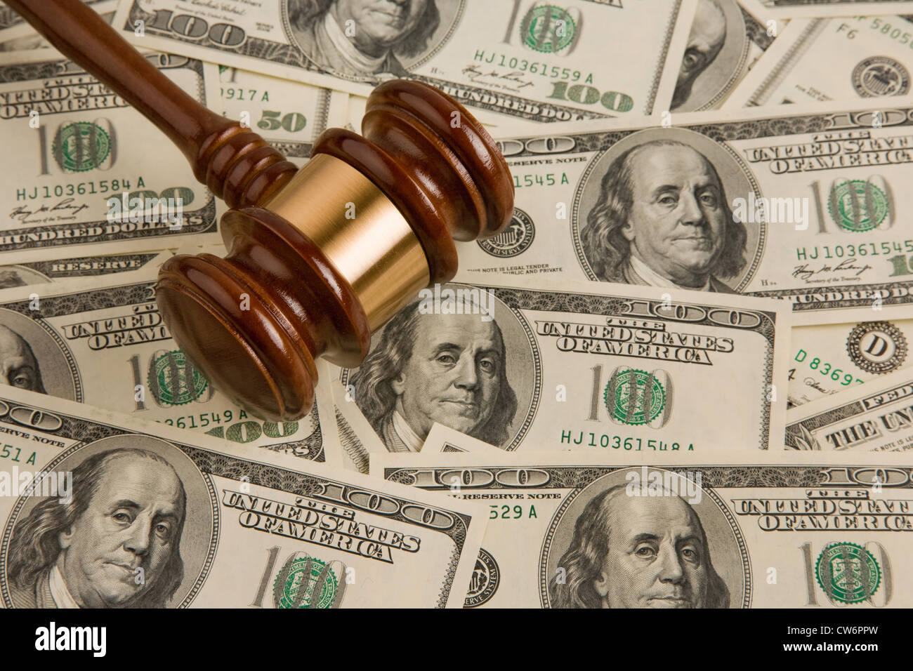Dollars bills and a judge hammer hi-res stock photography and images ...