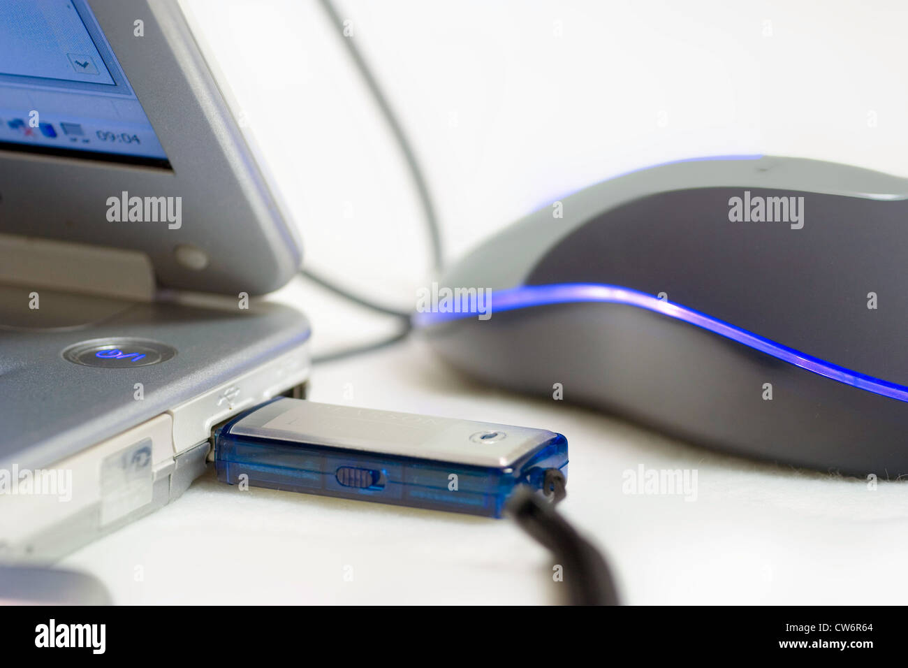 USB stick with laptop and computer mouse Stock Photo - Alamy