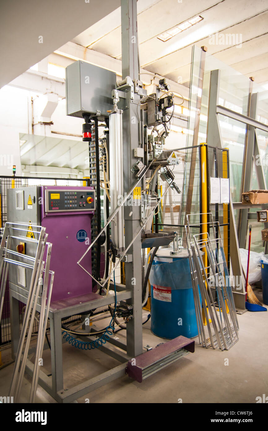 Machinery in a window glass factory Stock Photo - Alamy