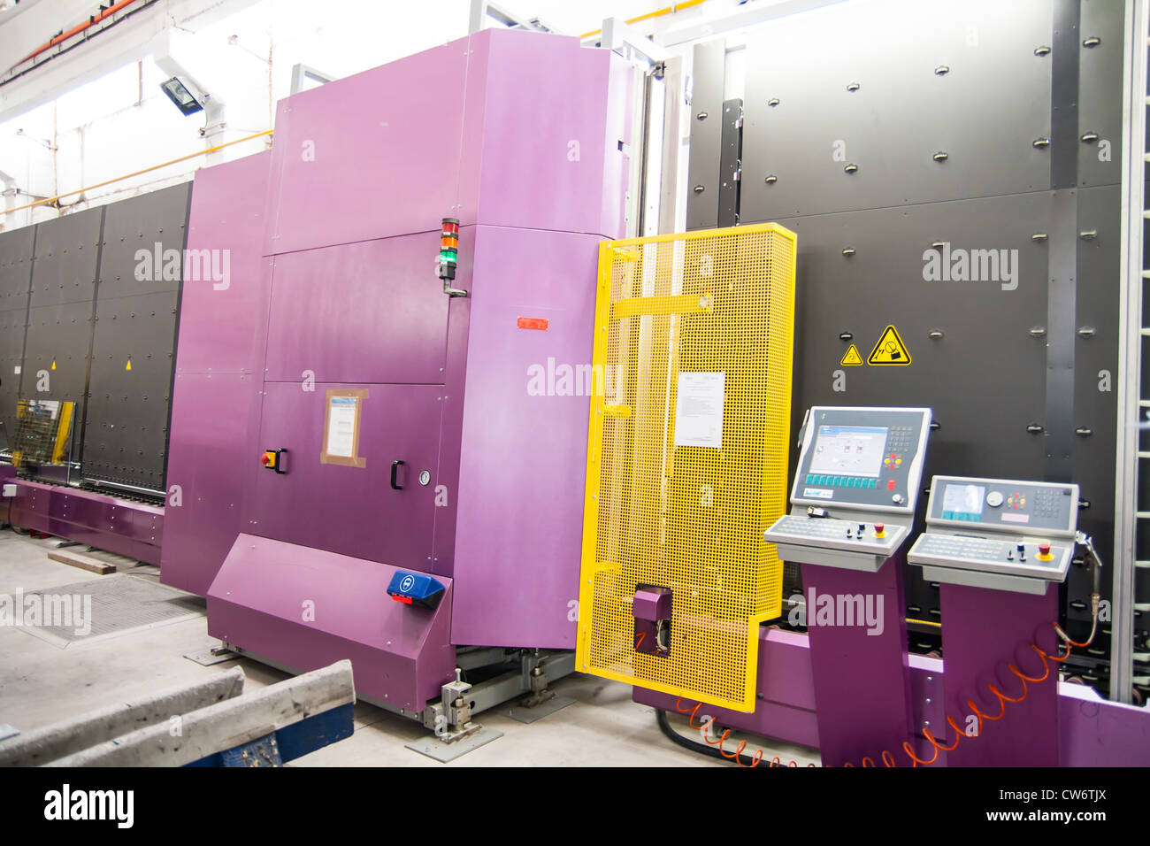 Machinery in a window glass factory Stock Photo - Alamy