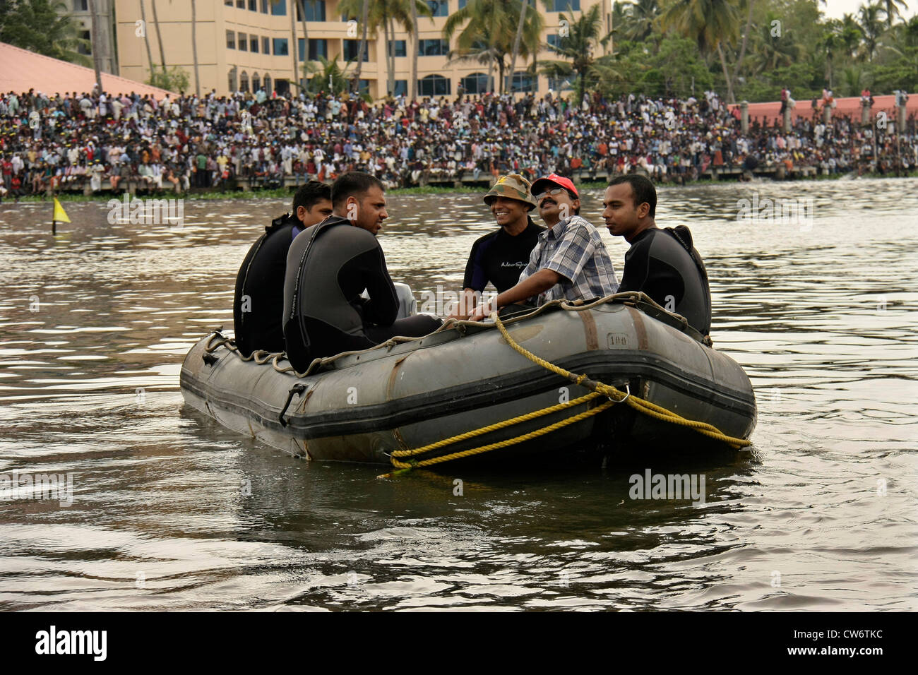 kerala fire and rescue service&diving experts in a inflated rescue boat ...