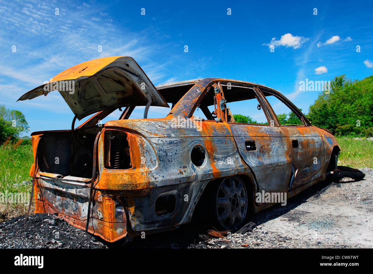 car wreck burned out Stock Photo - Alamy