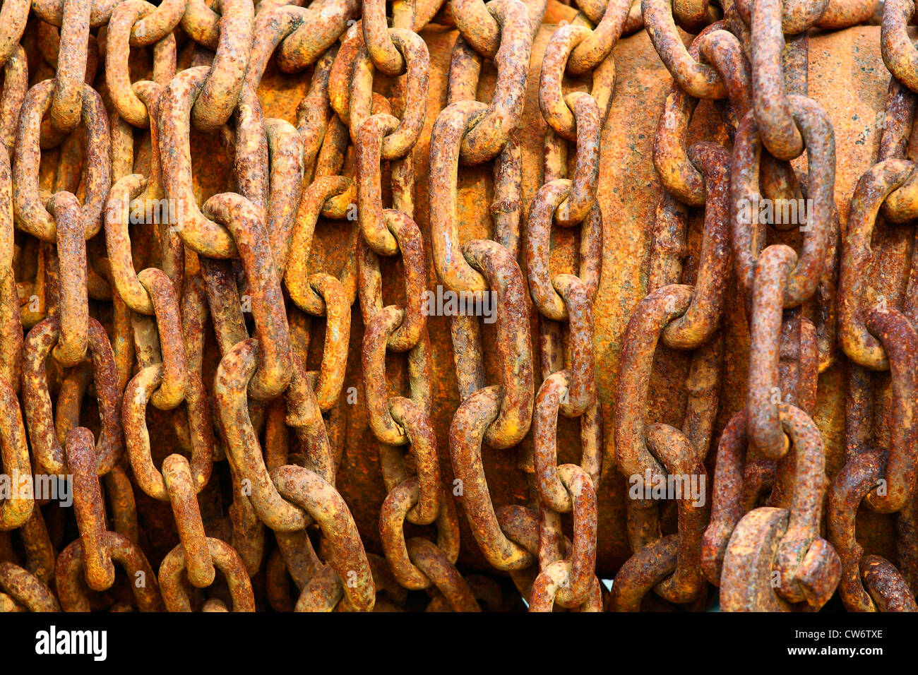 rusty iron chain on a reel Stock Photo - Alamy