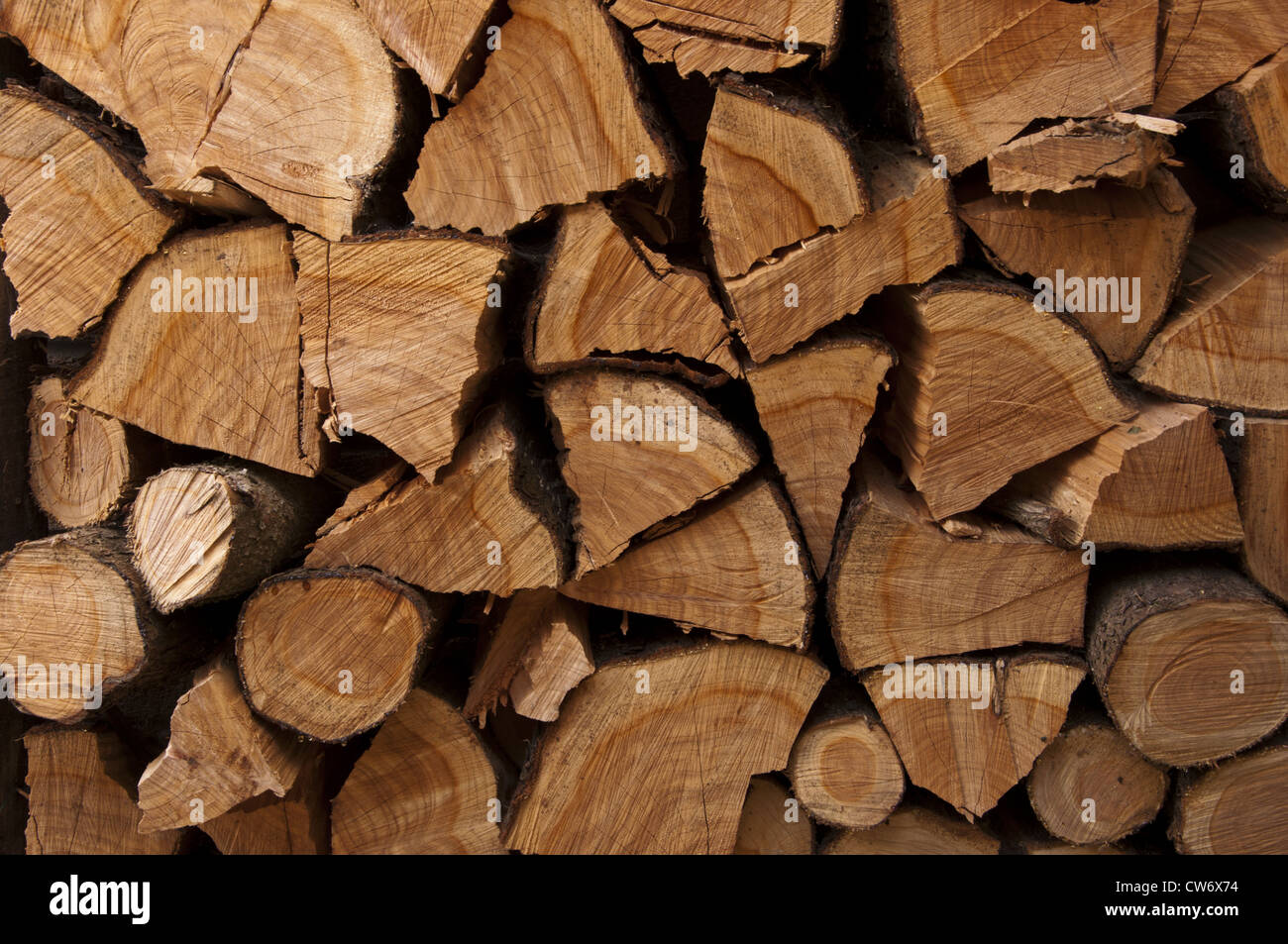 fire wood split logs in log pile Stock Photo - Alamy