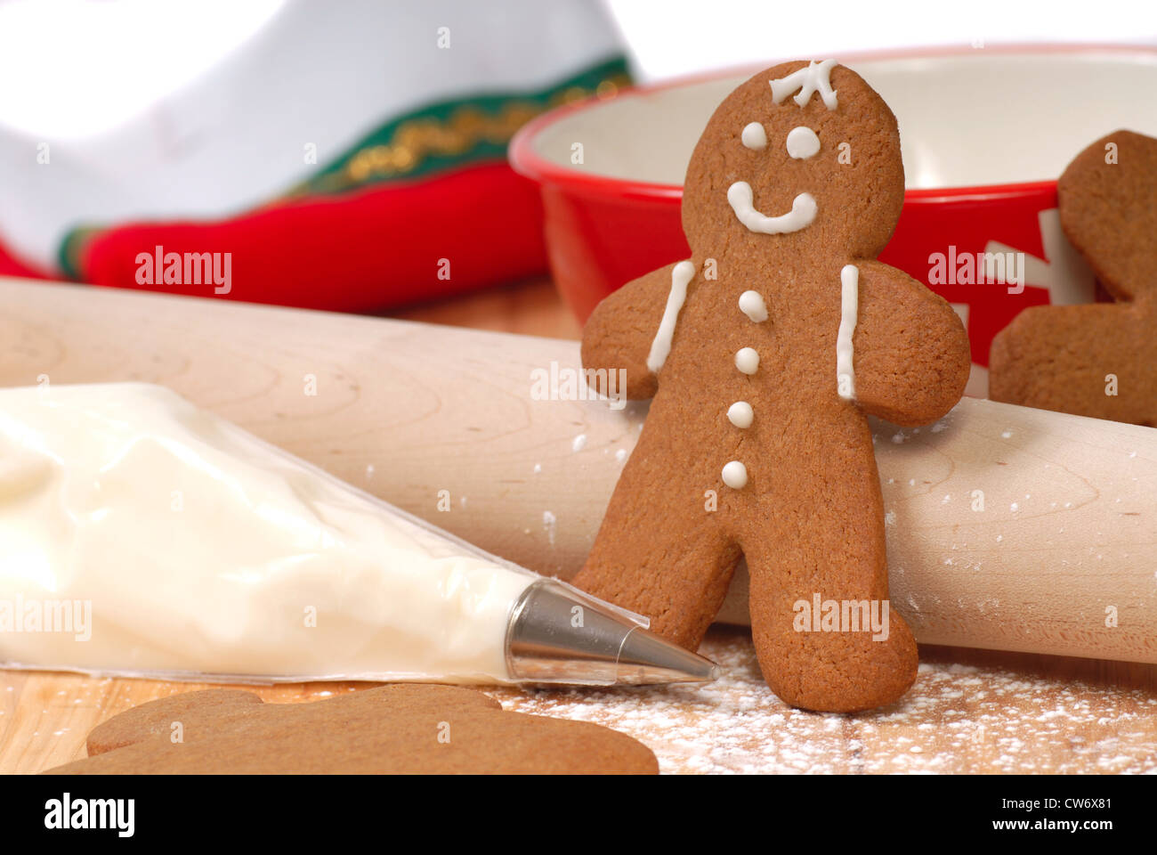 Kitchen scene showing the making and decorating of Christmas ...