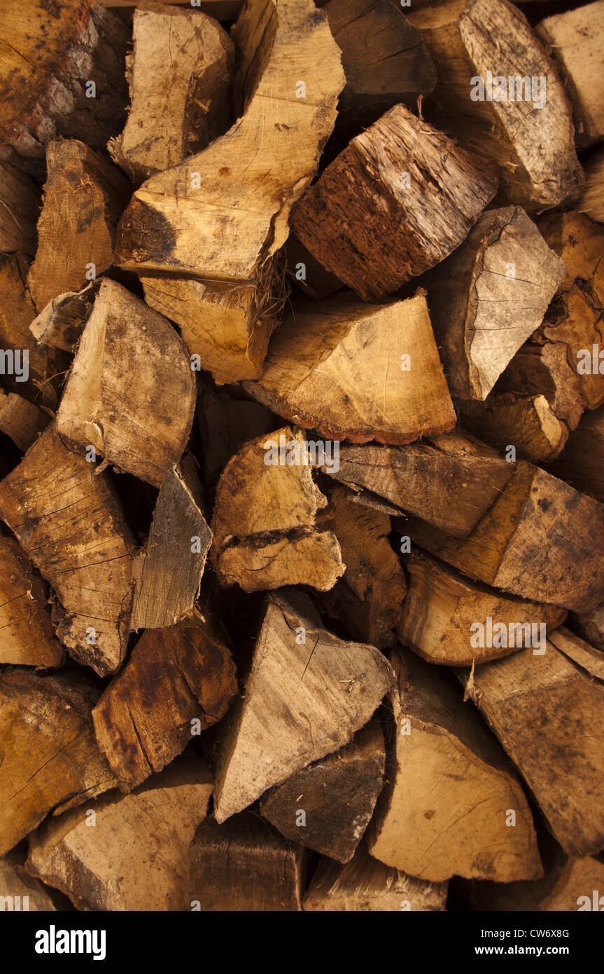 fire wood split logs in log pile Stock Photo - Alamy
