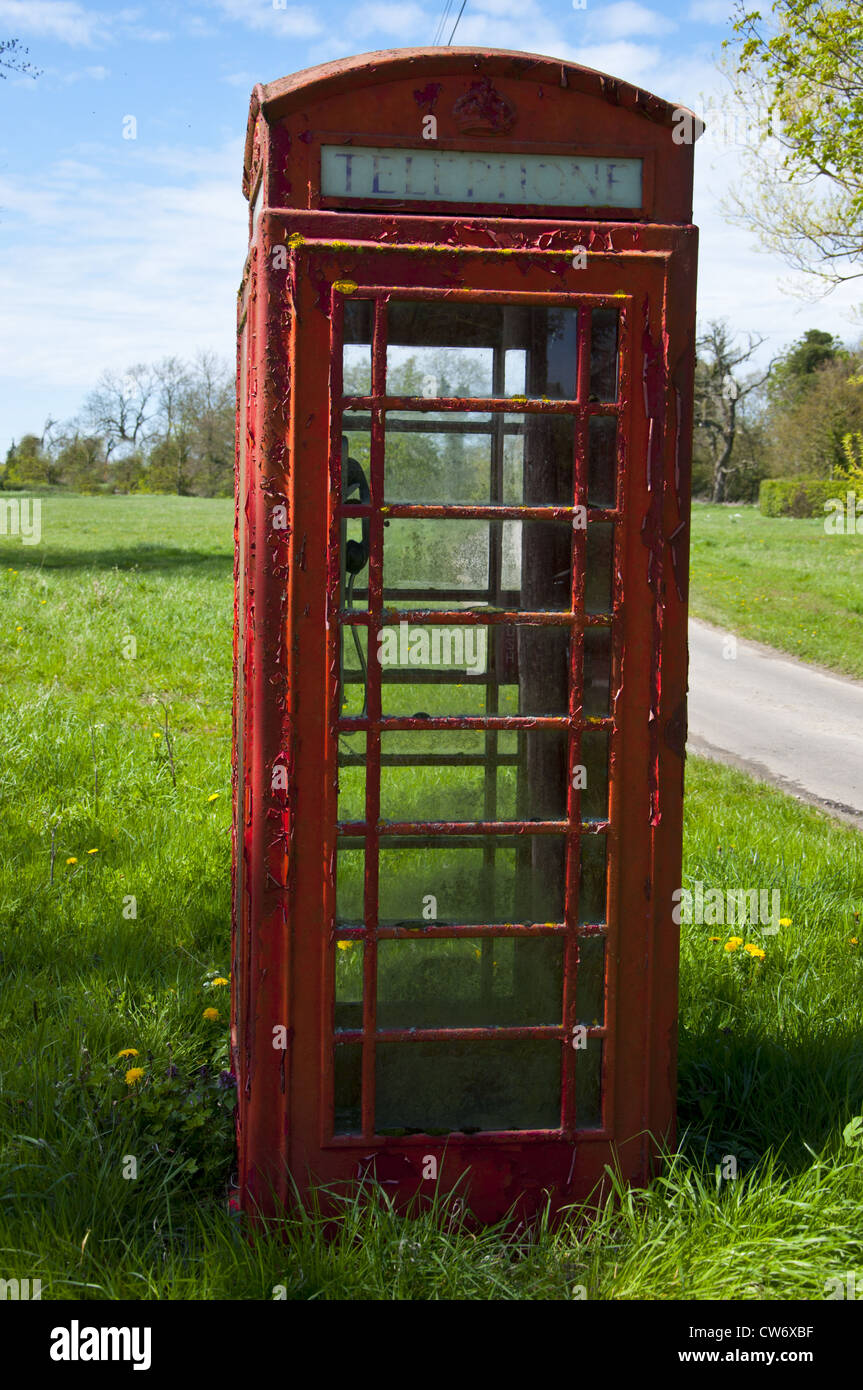 Red phone box in rural village Stock Photo - Alamy