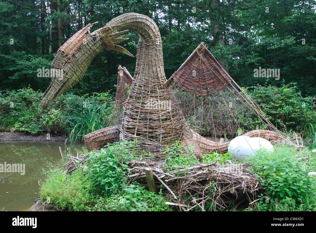 Wicker work dinosaur at Groombridge Place Gardens Kent Stock Photo - Alamy