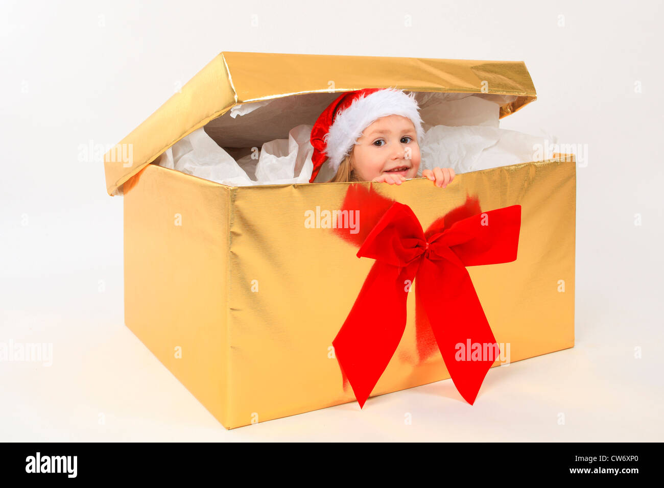 little girl dressed up as Santa Claus in a box, Switzerland Stock Photo ...