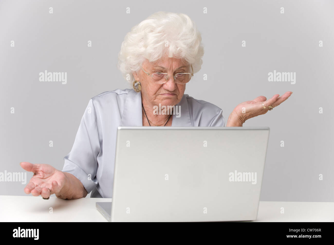old woman using laptop Stock Photo - Alamy