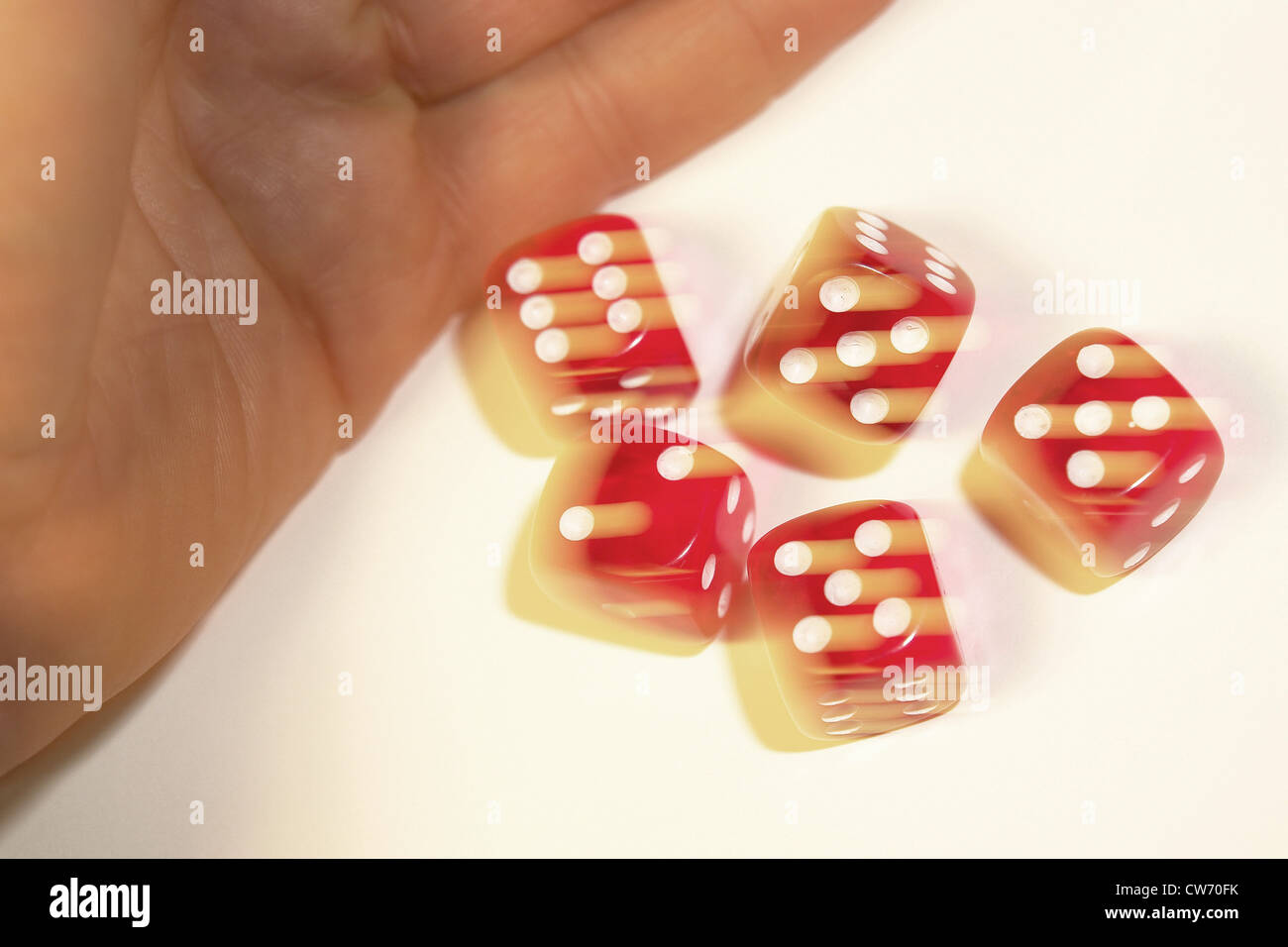 Hand rolling die dice hi-res stock photography and images - Alamy