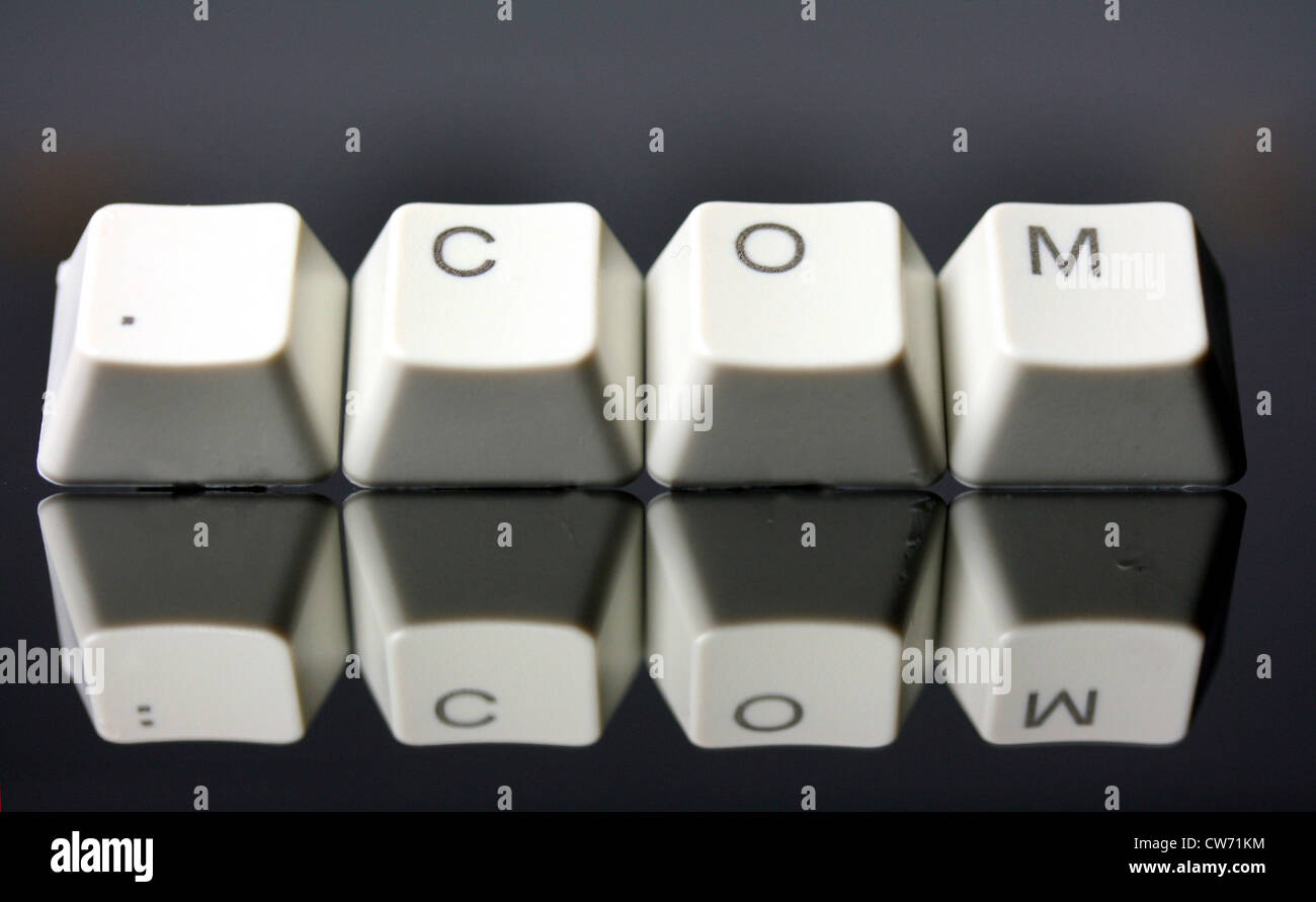 four computer keys adding up to the internet domain '.com' Stock Photo ...
