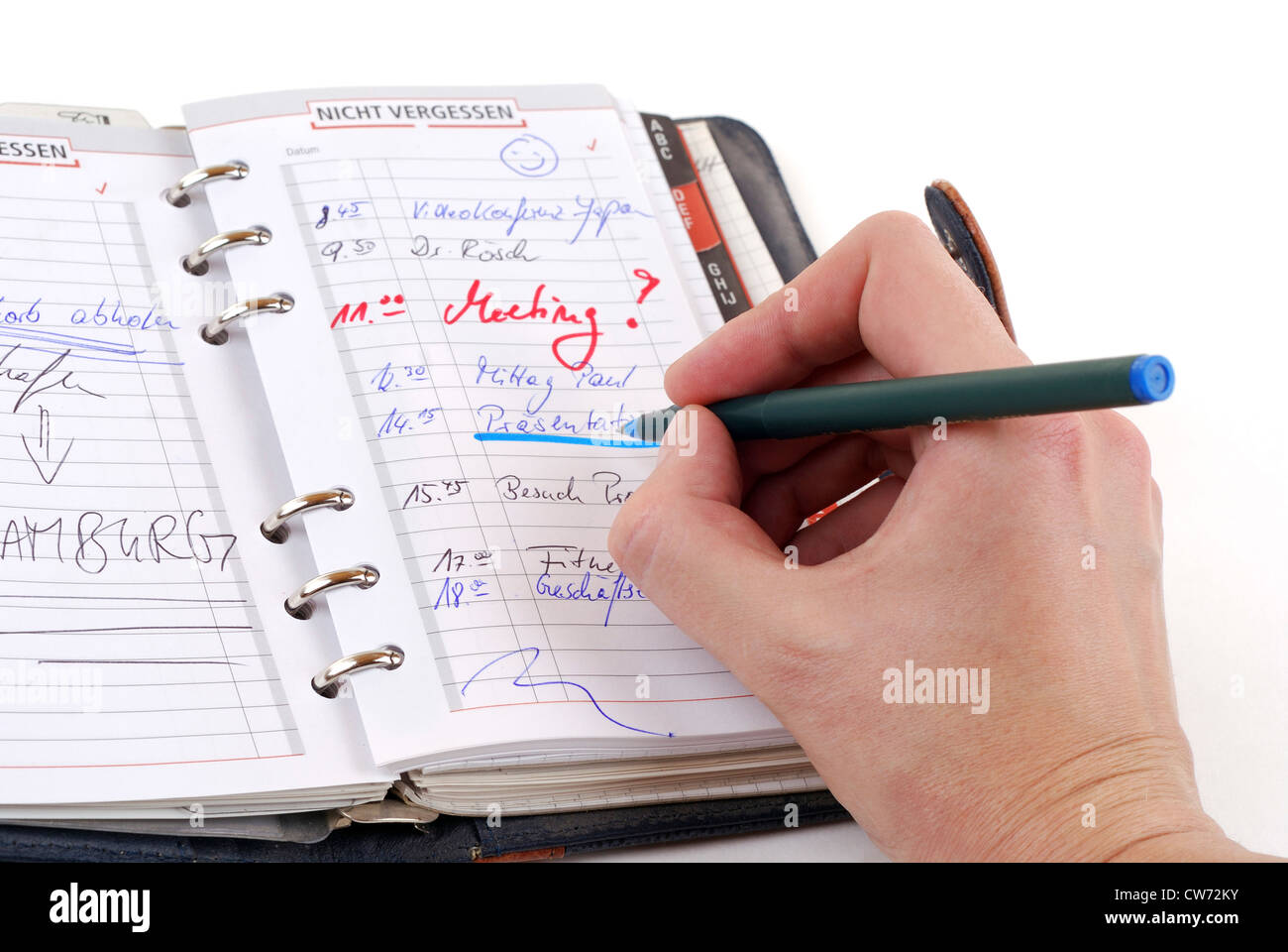 opened dairy with hand Stock Photo - Alamy