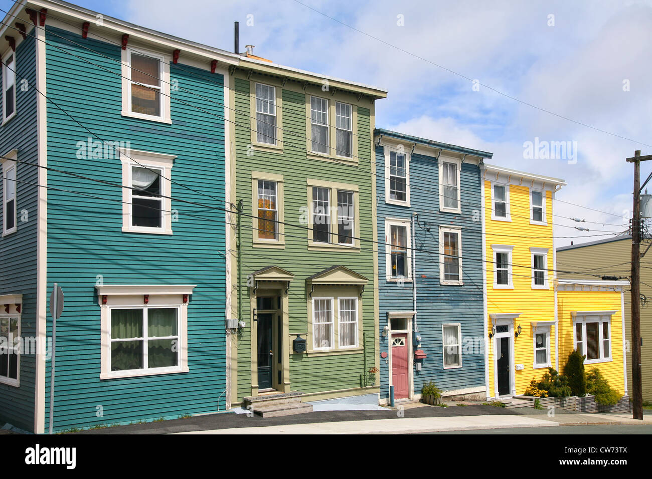 Traditional wooden row houses on the hilly streets of St. John's ...