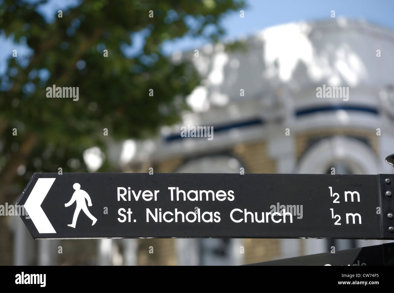 sign with directions and distances to the river thames and st nicholas ...
