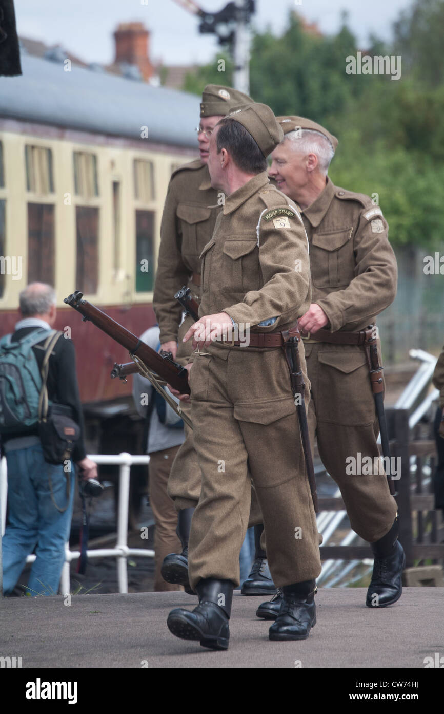 Home Guard on platform with train Stock Photo - Alamy