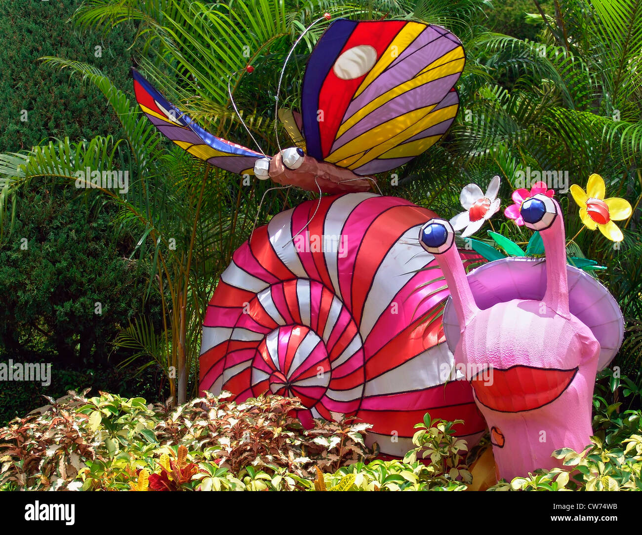snail as garden decoration, Singapore Stock Photo - Alamy