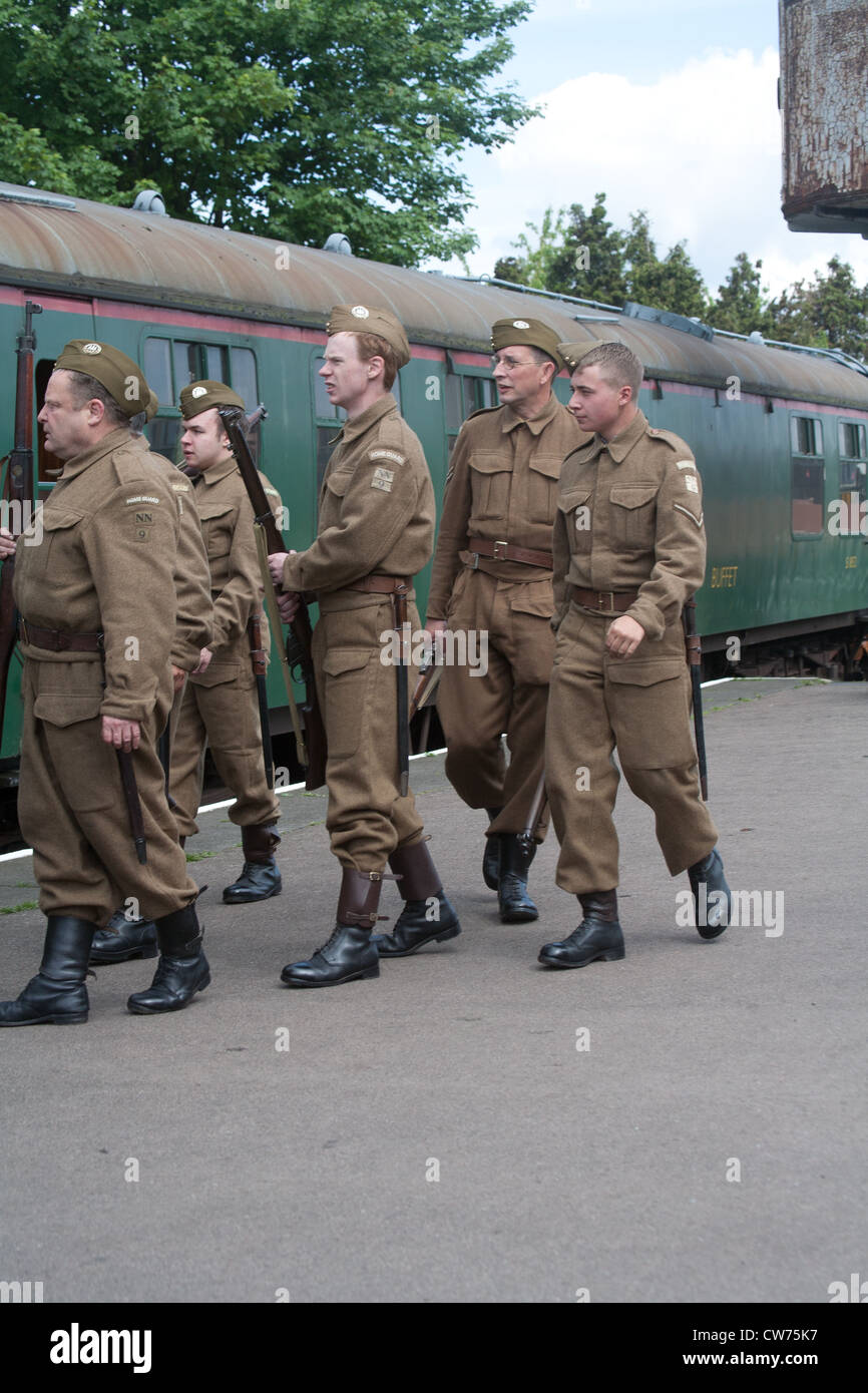 Home Guard on platform with train Stock Photo - Alamy