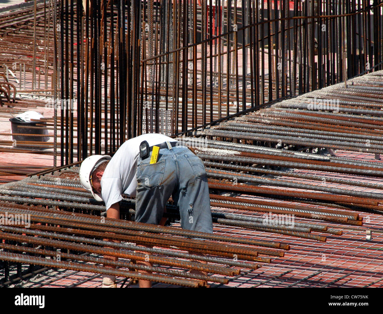 Construction worker working on a building site hi-res stock photography ...