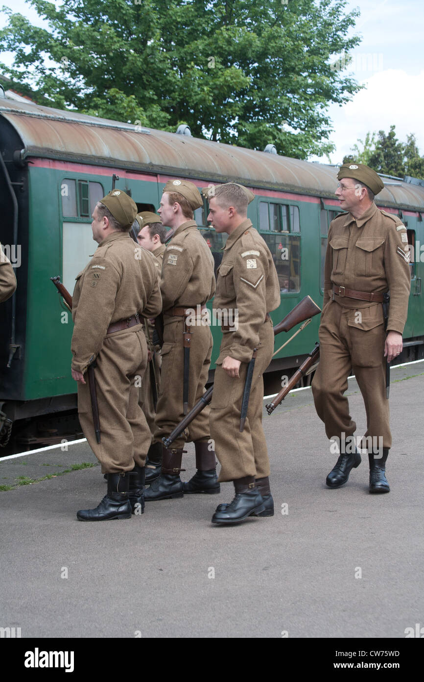 Home Guard on platform with train Stock Photo - Alamy