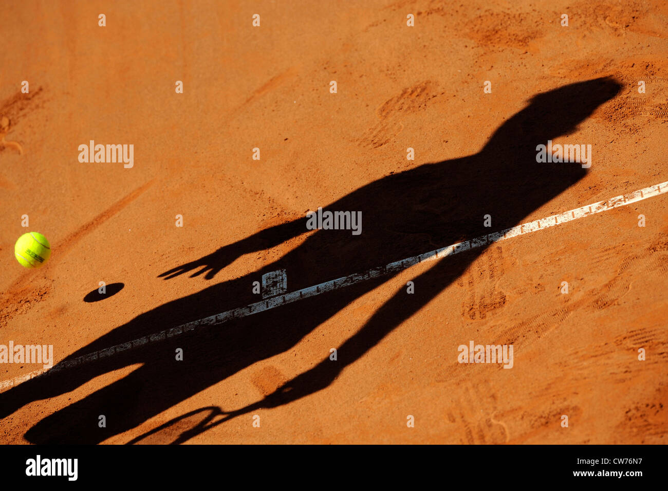 shadow of a tennis player Stock Photo - Alamy
