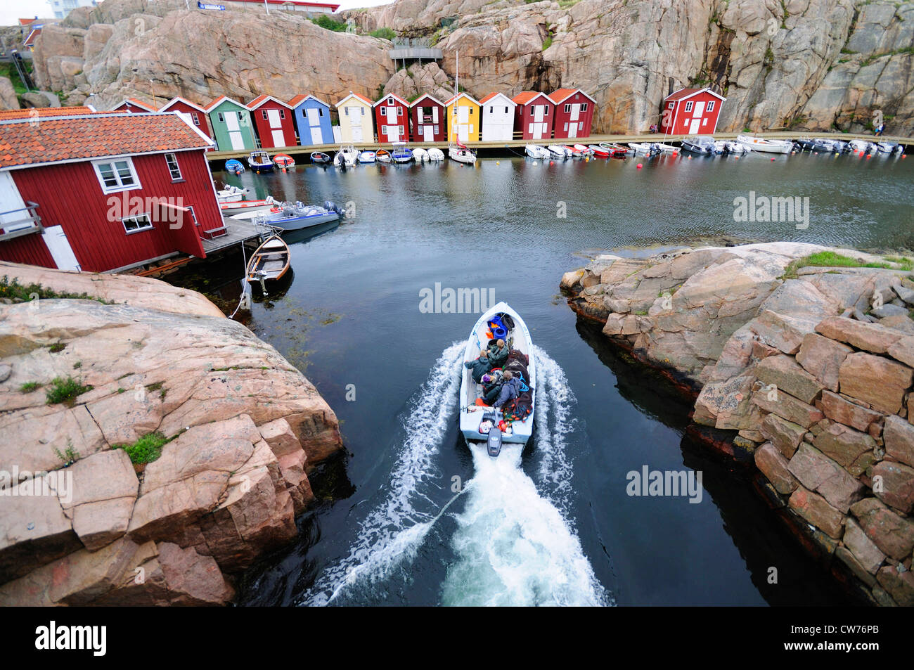 colourful fishing huts between rocks, Sweden, Bohuslaen, Smoegen Stock ...