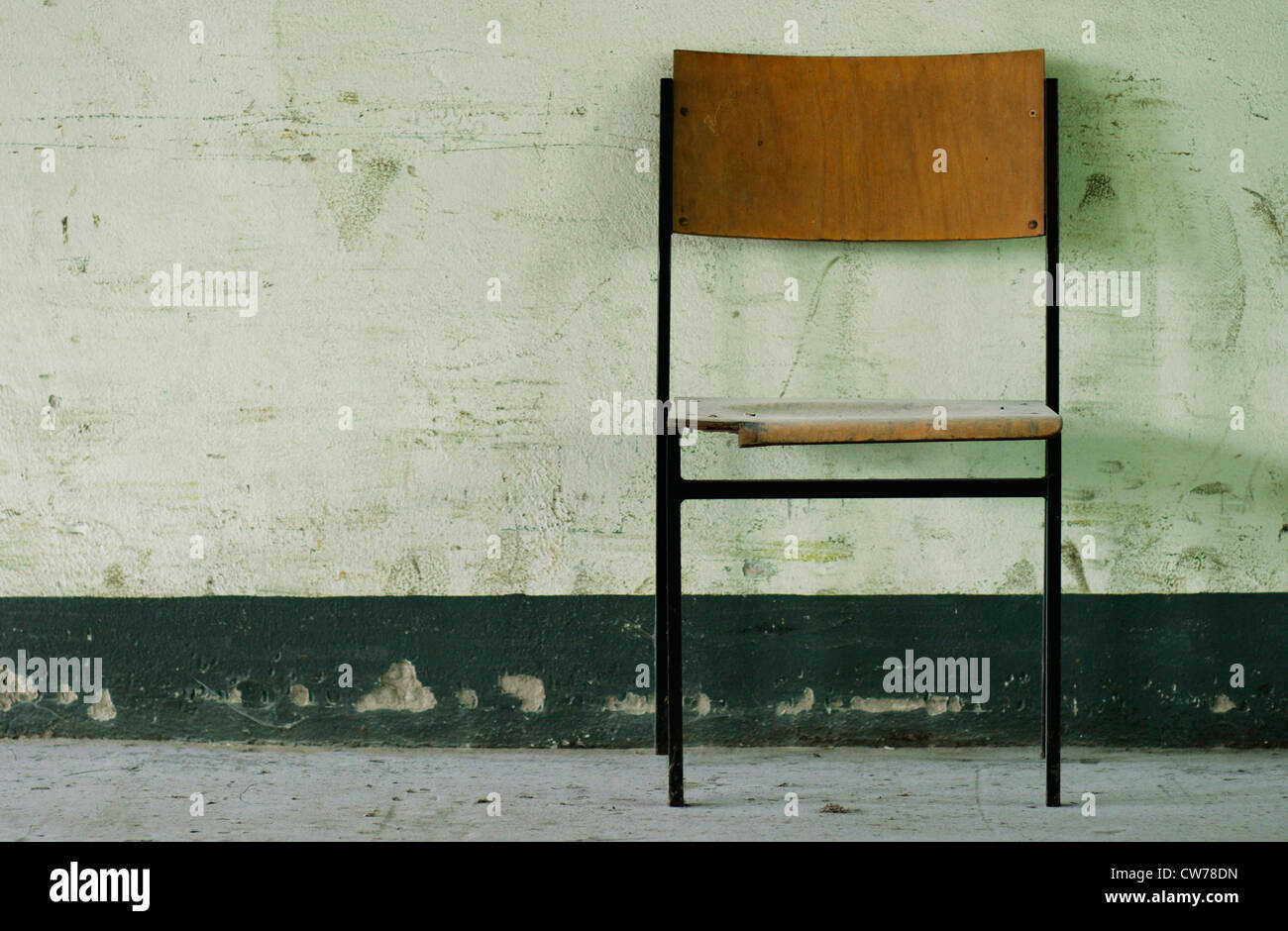 chair in front of house wall Stock Photo - Alamy