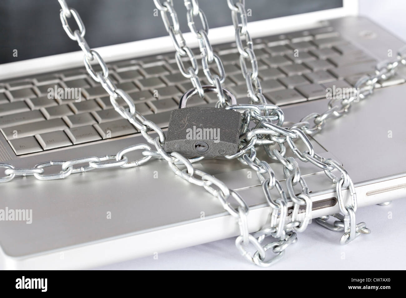 Computer security concept with laptop and chain Stock Photo - Alamy
