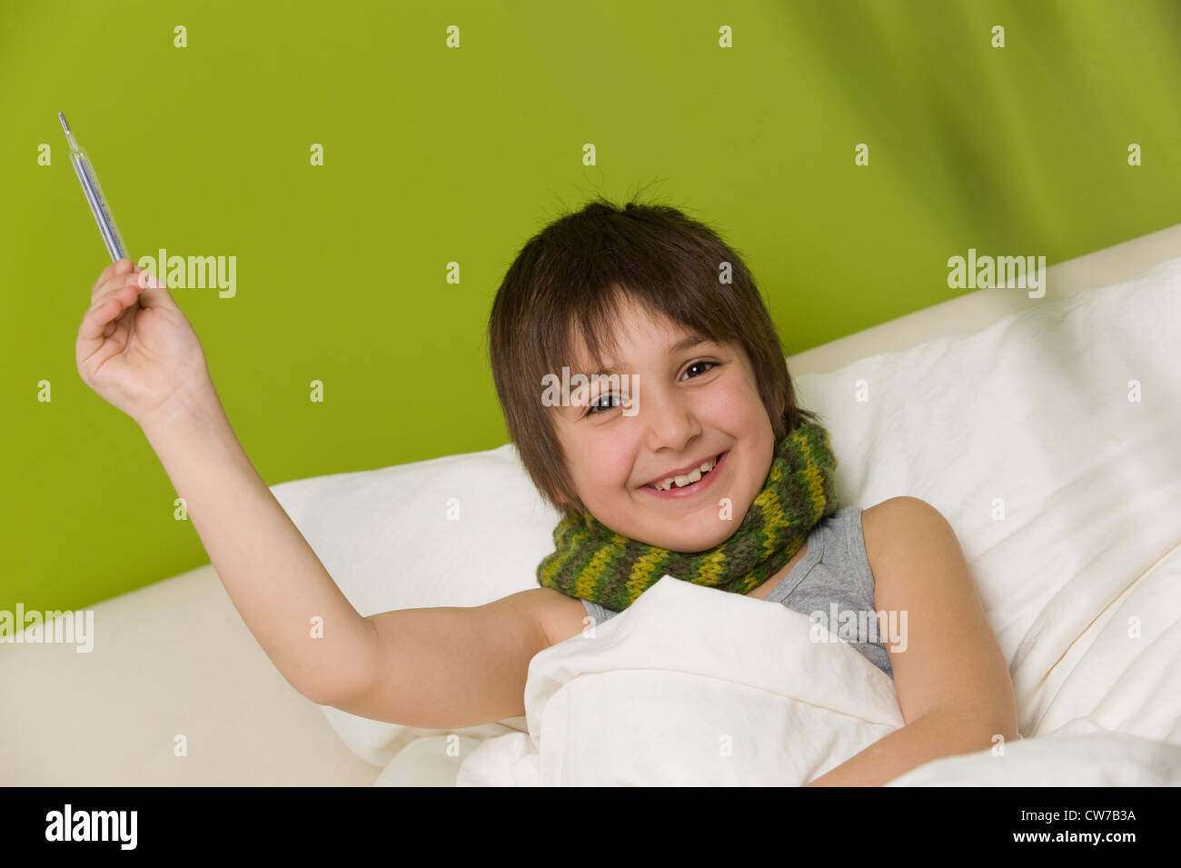boy with thermometer in his hand getting well Stock Photo - Alamy