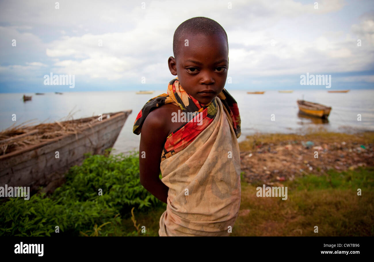 portrait of a young girl on the lakefront of Lake Tanganyika, Burundi ...