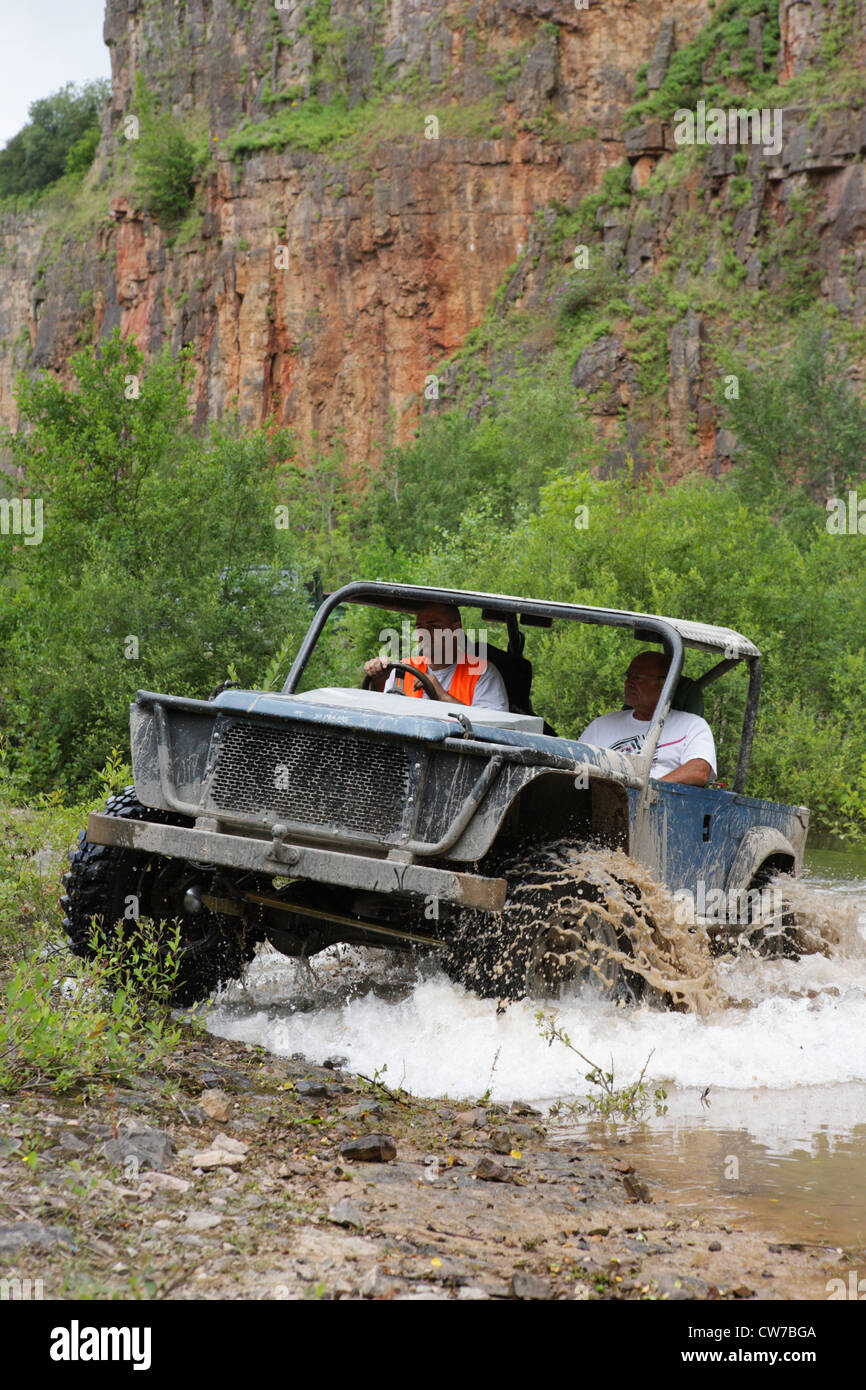 Members of a 4x4 club enjoy a day at the private off road facility at ...