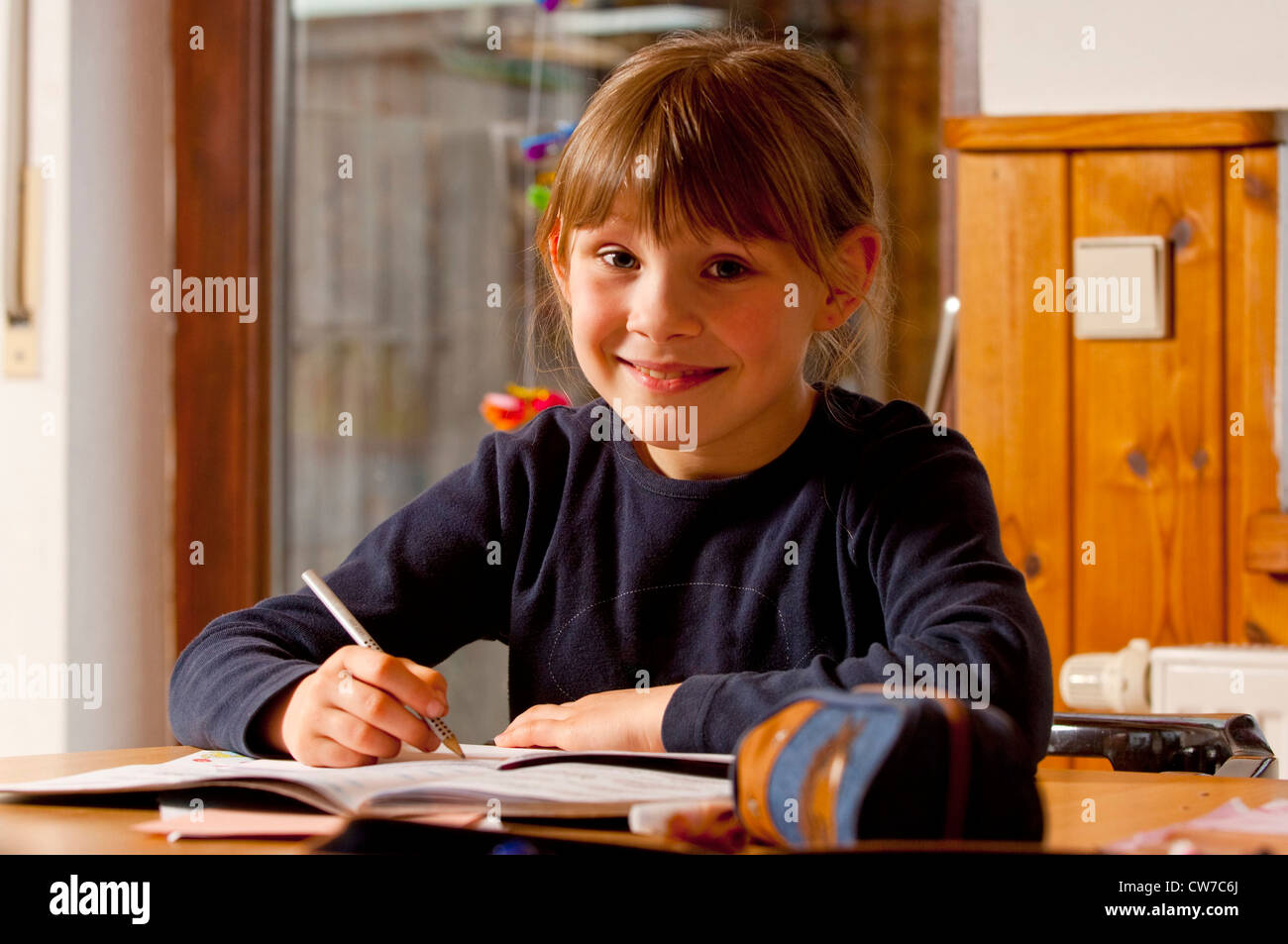 girl doing homework Stock Photo - Alamy