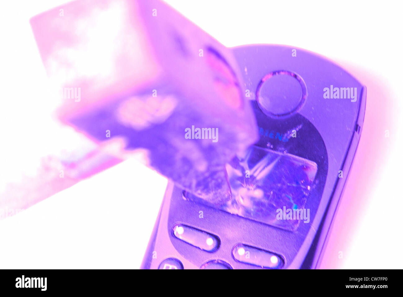 Mobile phone with hammer Stock Photo - Alamy