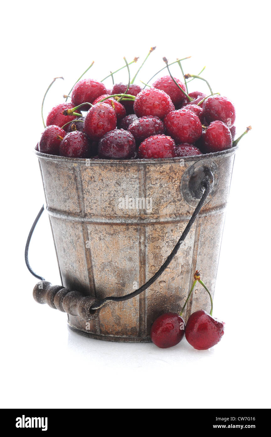 Cherry in a bucket Cut Out Stock Images & Pictures - Alamy