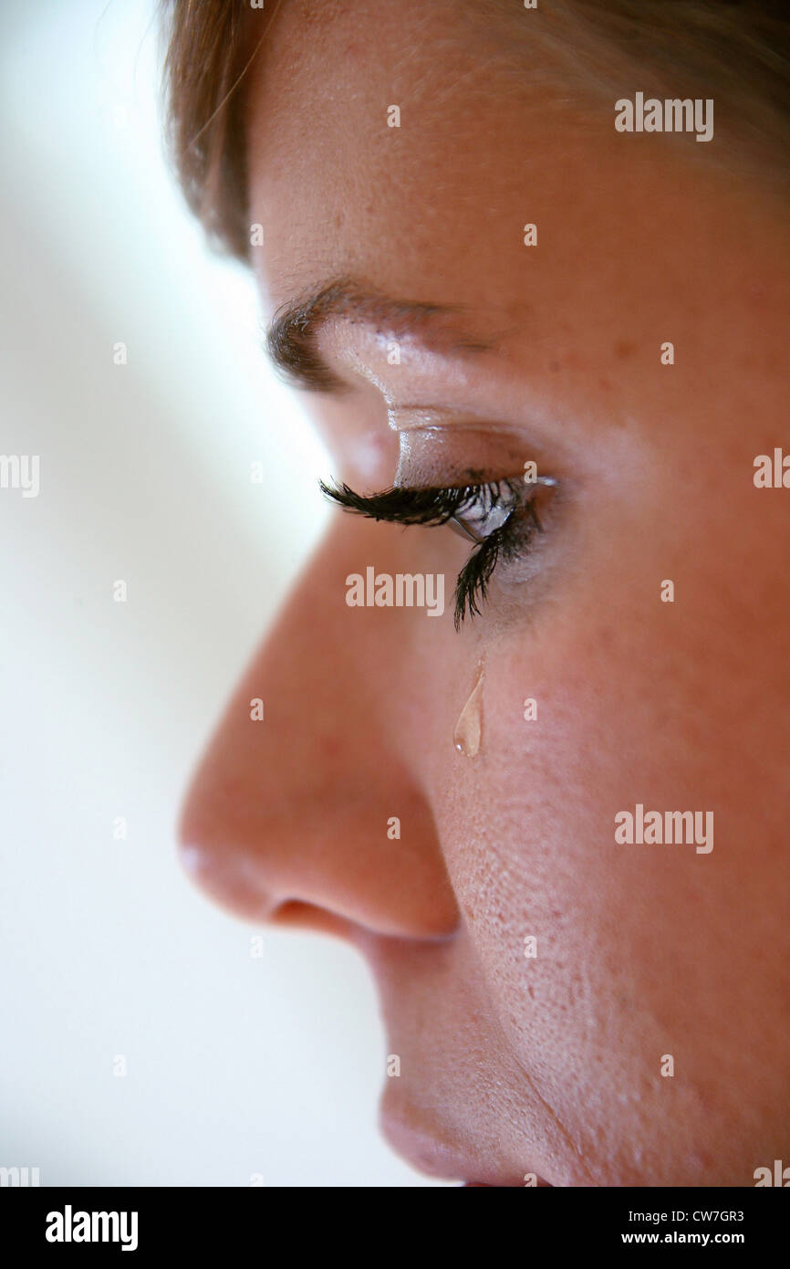 Portrait of a woman with tear Stock Photo - Alamy