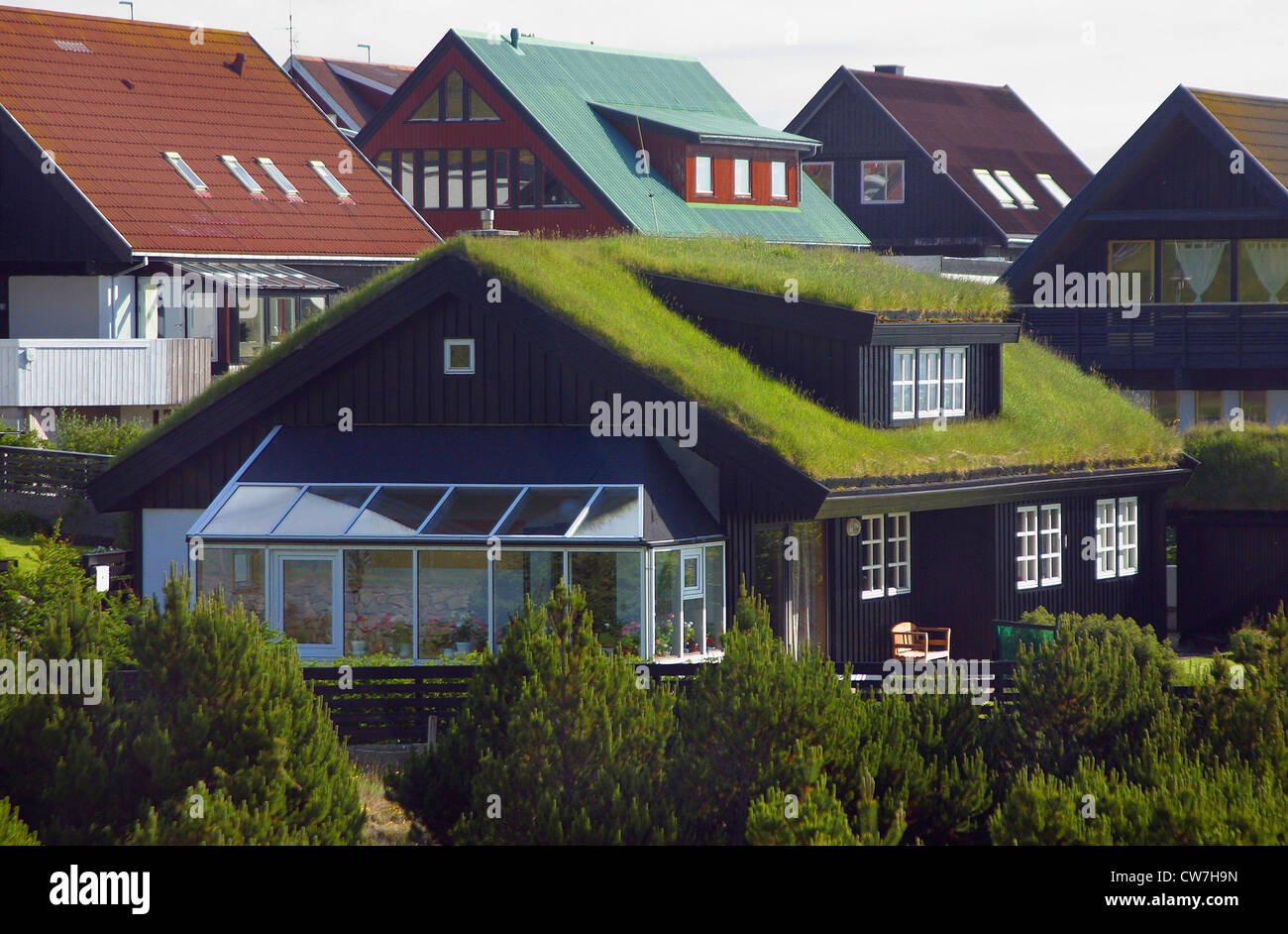 wooden residential buildings with green roofs and winter garden ...