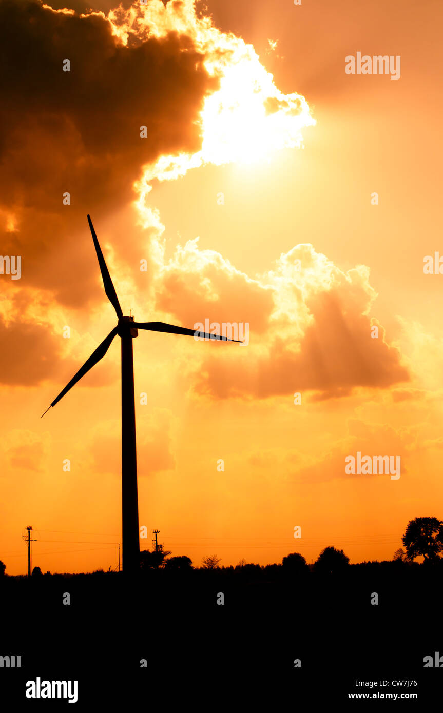 Wind turbine farm at sunset Stock Photo - Alamy