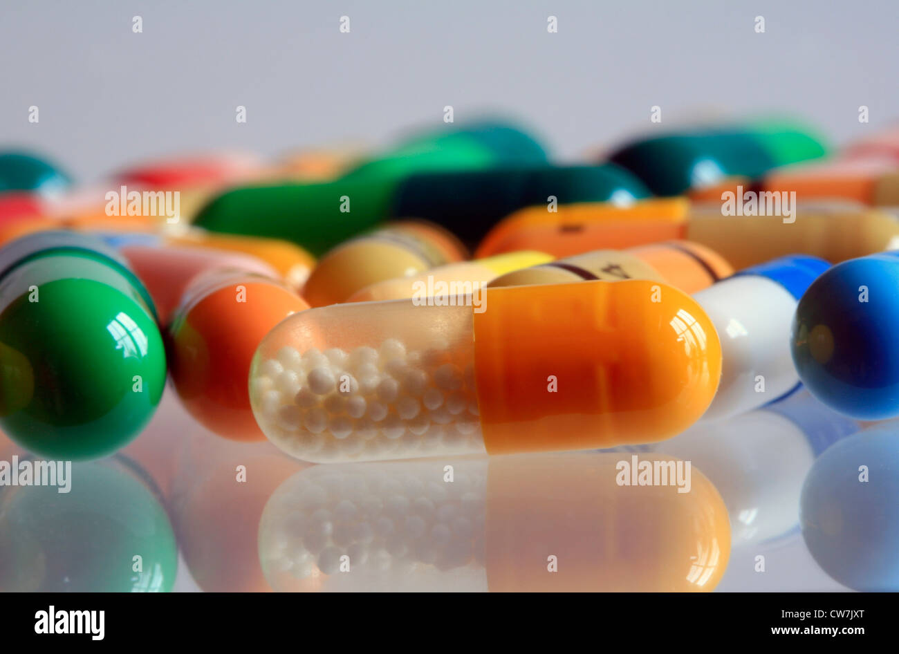 Different colourful pill capsules hi-res stock photography and images ...
