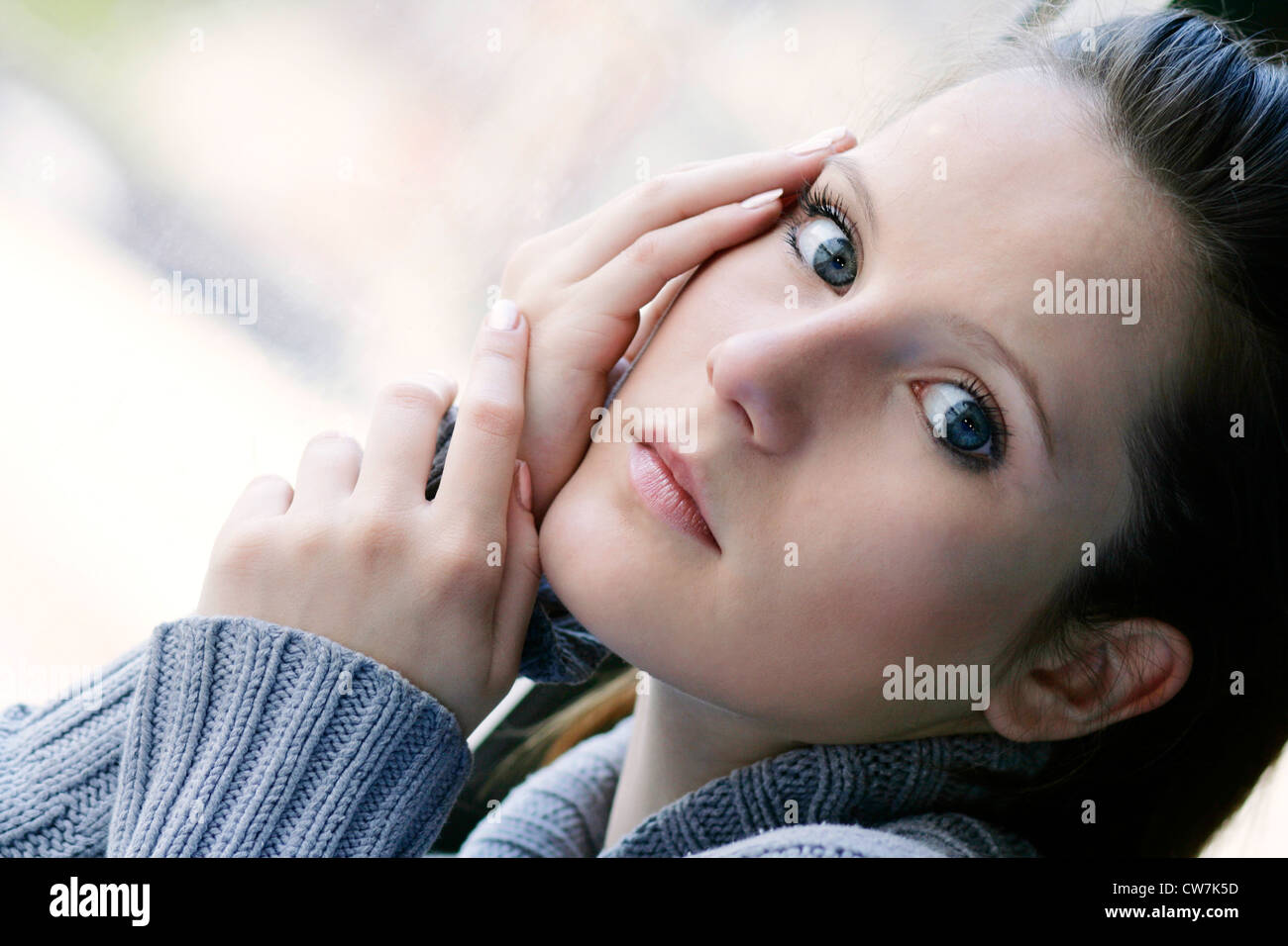 young absent-minded woman Stock Photo - Alamy