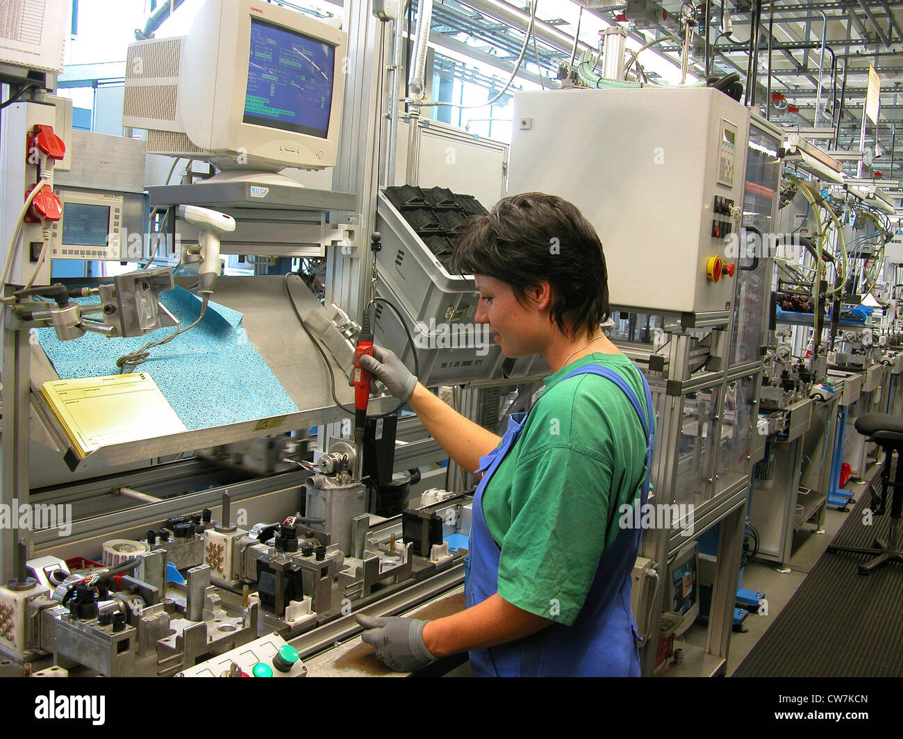 Women working at assembly line hi-res stock photography and images - Alamy
