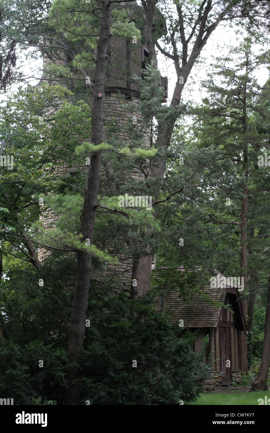 A building with a tower at the Plummer House in Rochester, Minnesota ...