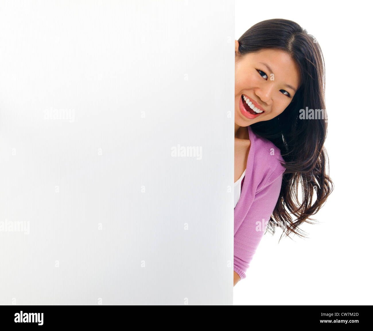 Cheerful young Asian woman hiding on a blank space Stock Photo - Alamy